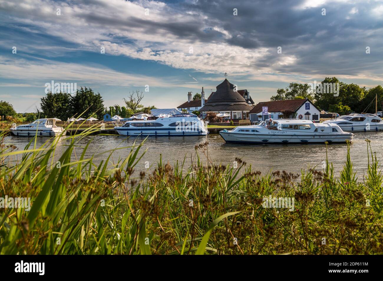 Boats on River Bure at Acle Bridge, Norfolk Broads, Norfolk, England ...