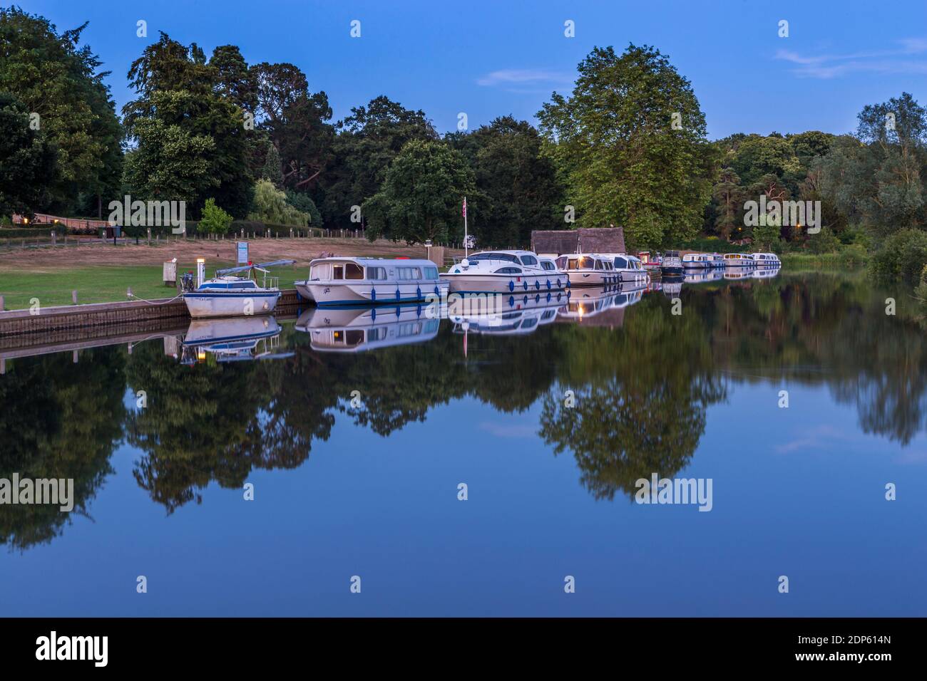 Boats on River Bure at Coltishall after sunset, Norfolk Broads, Norfolk ...