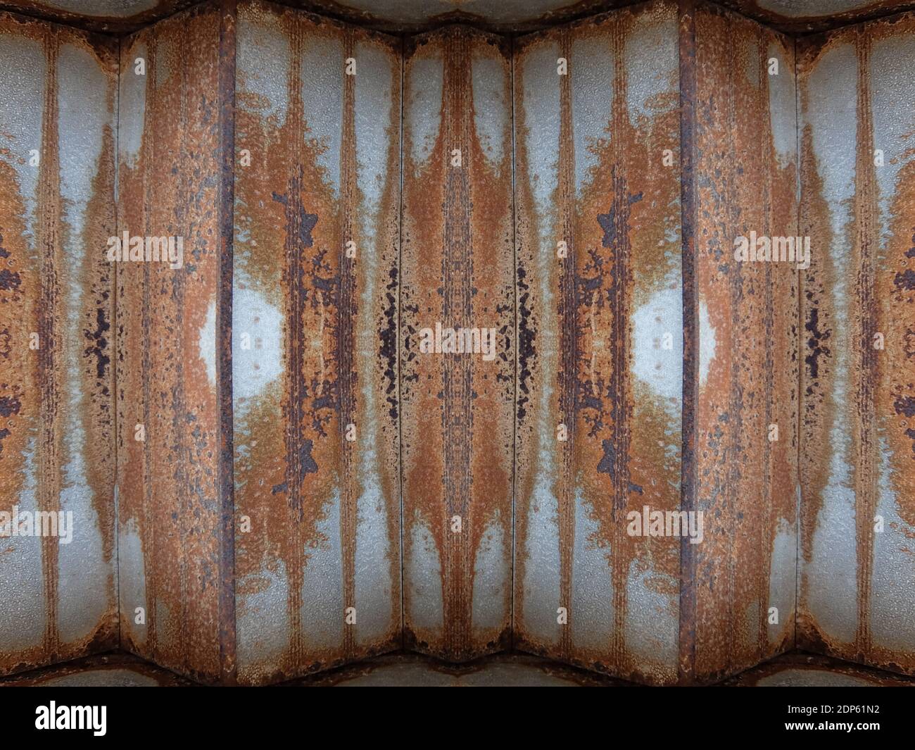 A kaleidoscope pattern of a rusty wall Stock Photo - Alamy
