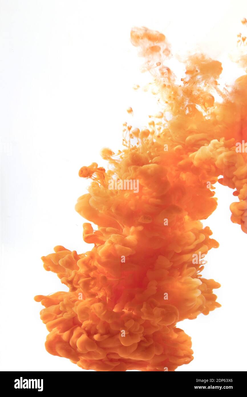 Orange watercolor ink in water hi-res stock photography and images - Alamy