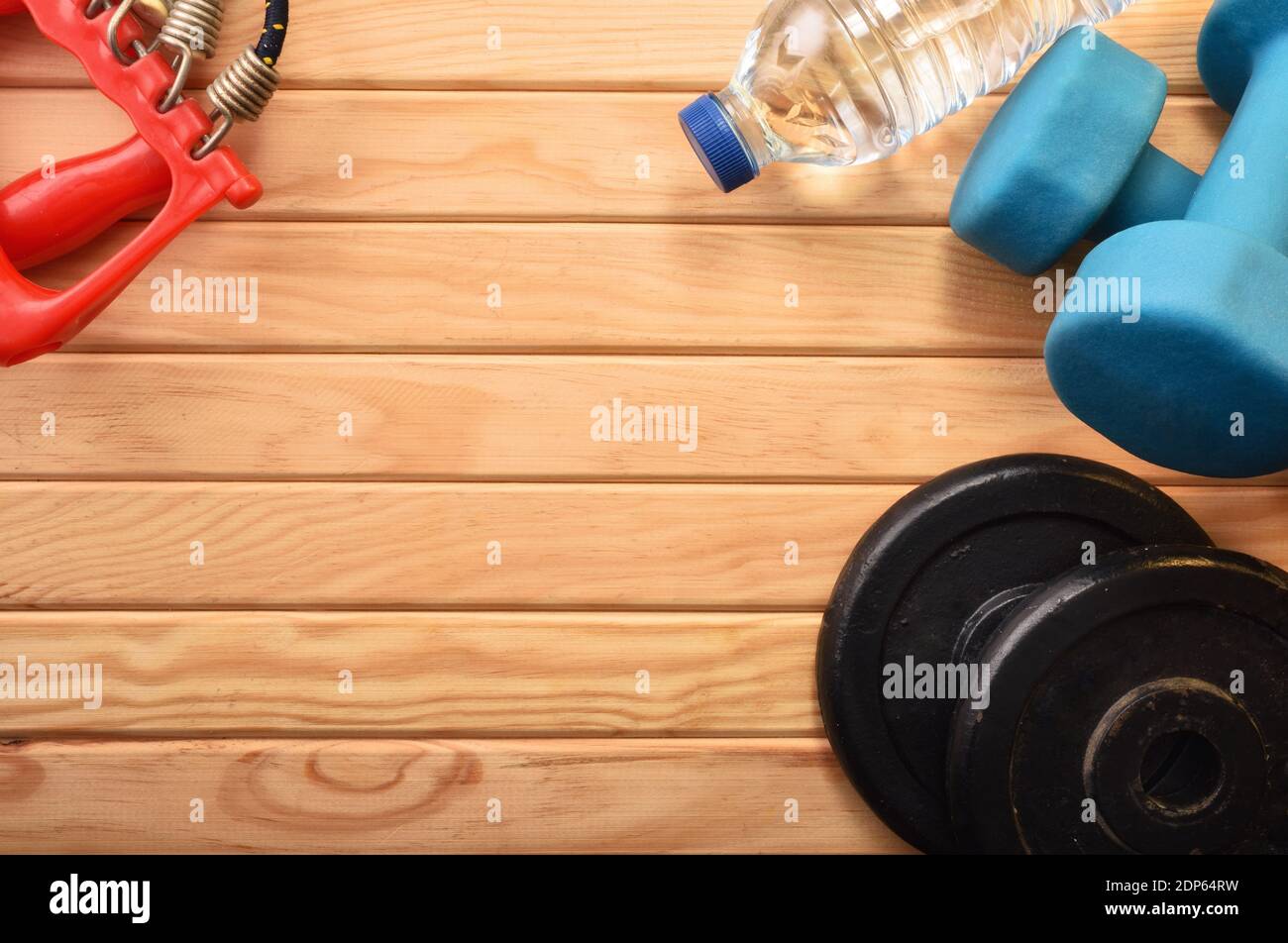 Background with sports strength accessories such as weight plates and ...