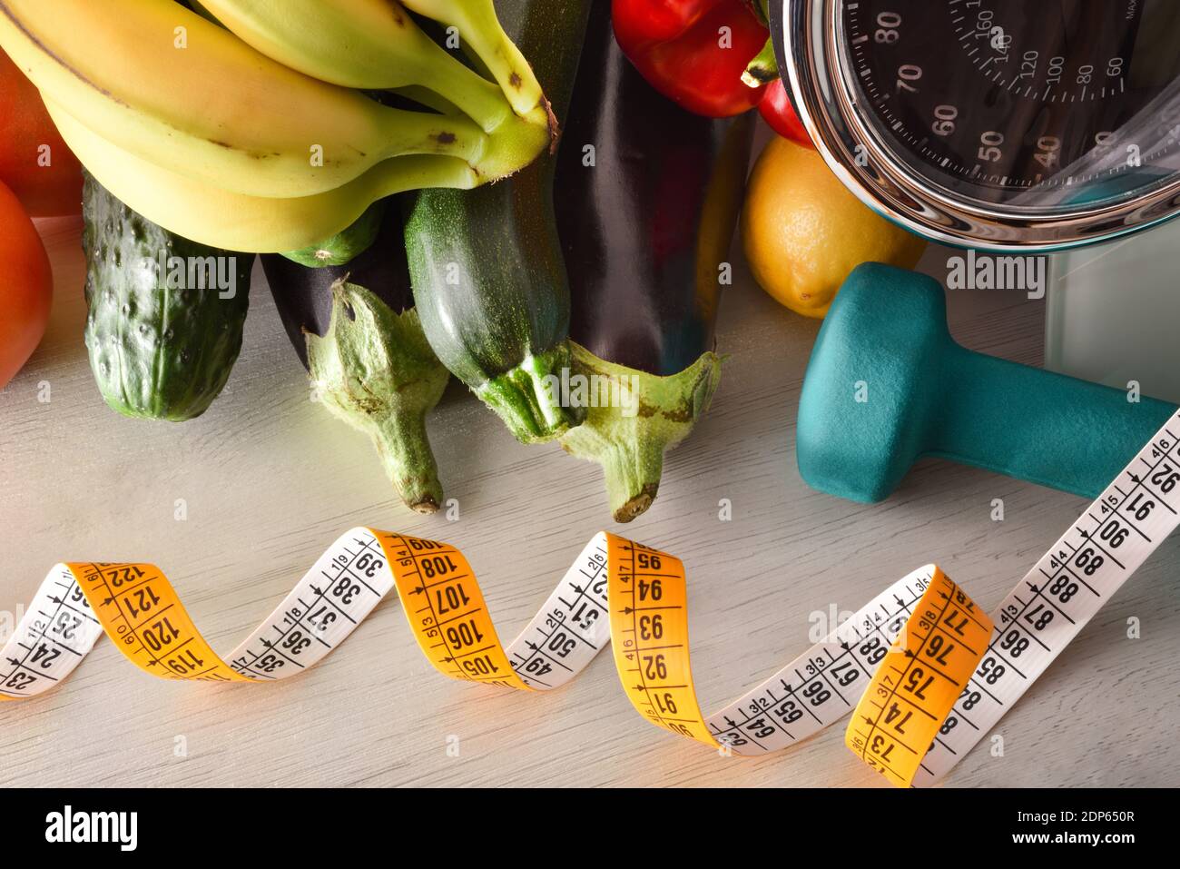 Sports items equipment and healthy food on wooden table for health care ...