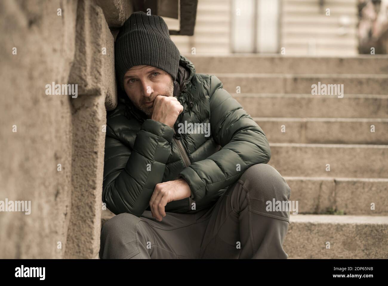 dark and edgy urban portrait of middle aged sad and depressed ...