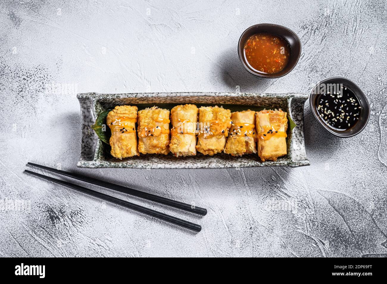 Fried spring rolls. White background. Traditional Chinese cuisine. Top ...