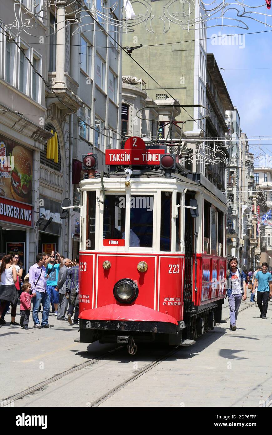 ISTANBUL,TURKEY-JUNE 7:A historic red tram traveling between Taksim and ...