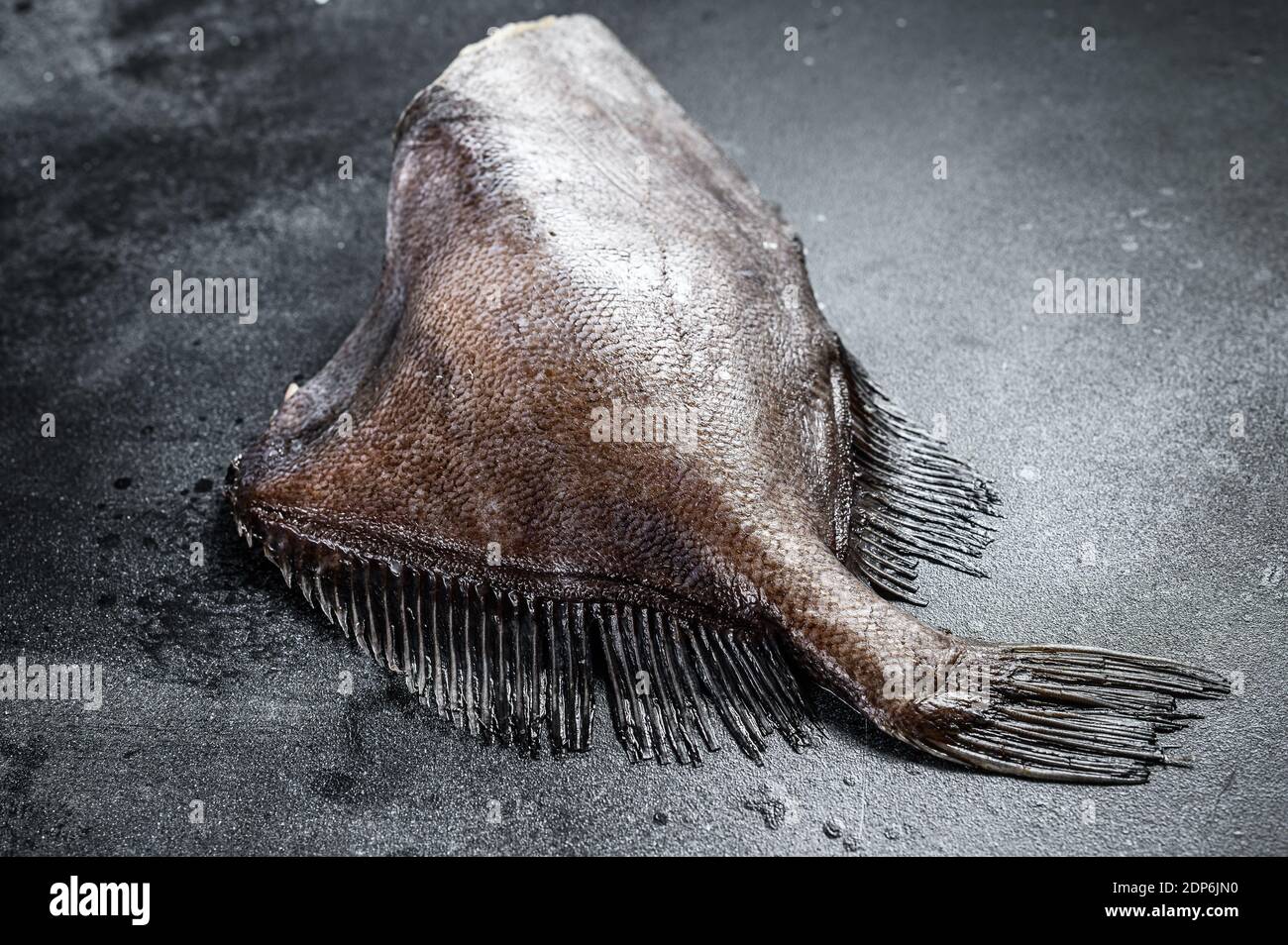 Raw fish John Dory. Black background. Top view. Copy space Stock Photo ...