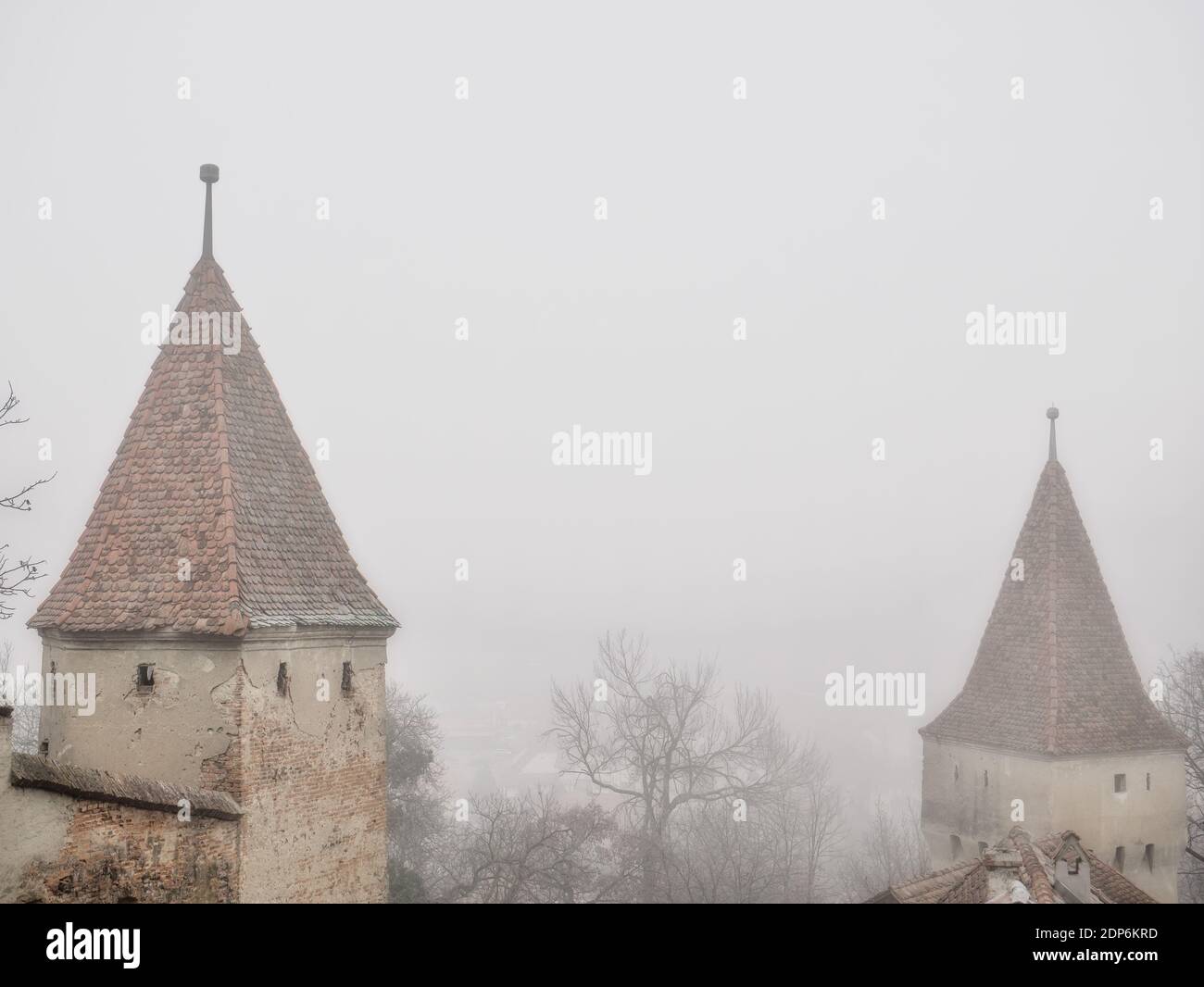Medieval defense towers on a misty morning in Sighisoara Citadel ...