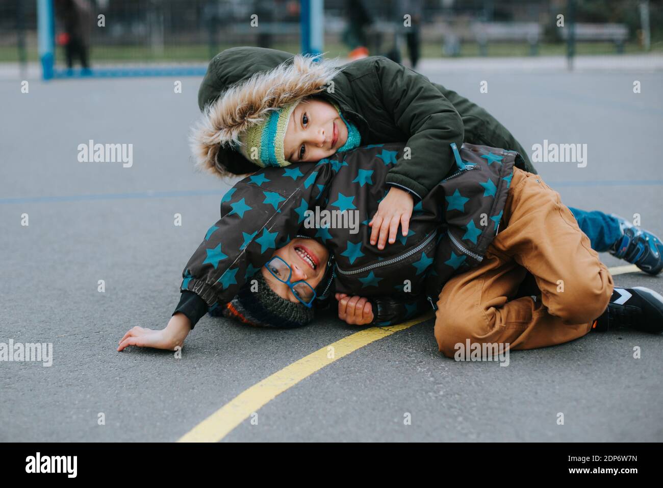 African boys hug hi-res stock photography and images - Alamy