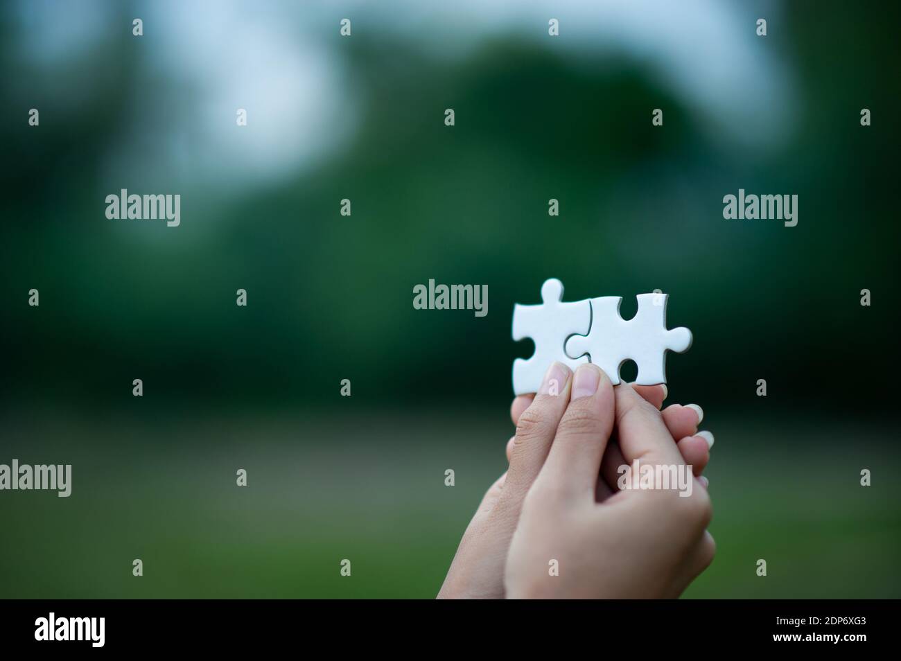 Hands And Puzzles Important Pieces Of Teamwork Teamwork Concept Stock hands-and-puzzles-important-pieces-of-teamwork-teamwork-concept-stock