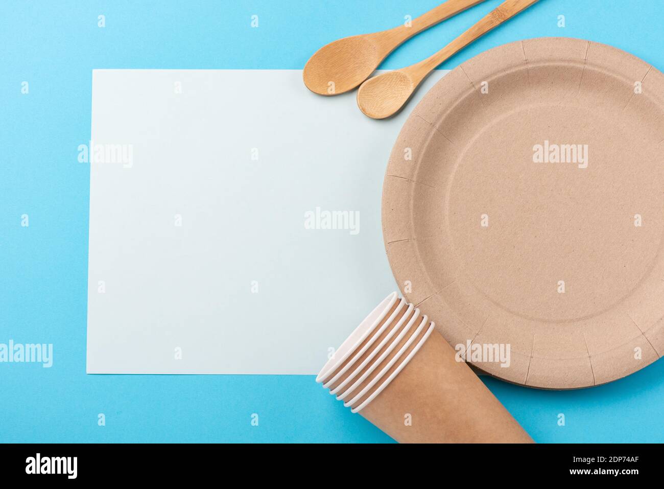 Eco-friendly biodegradable paper dishes on a blue background Stock ...