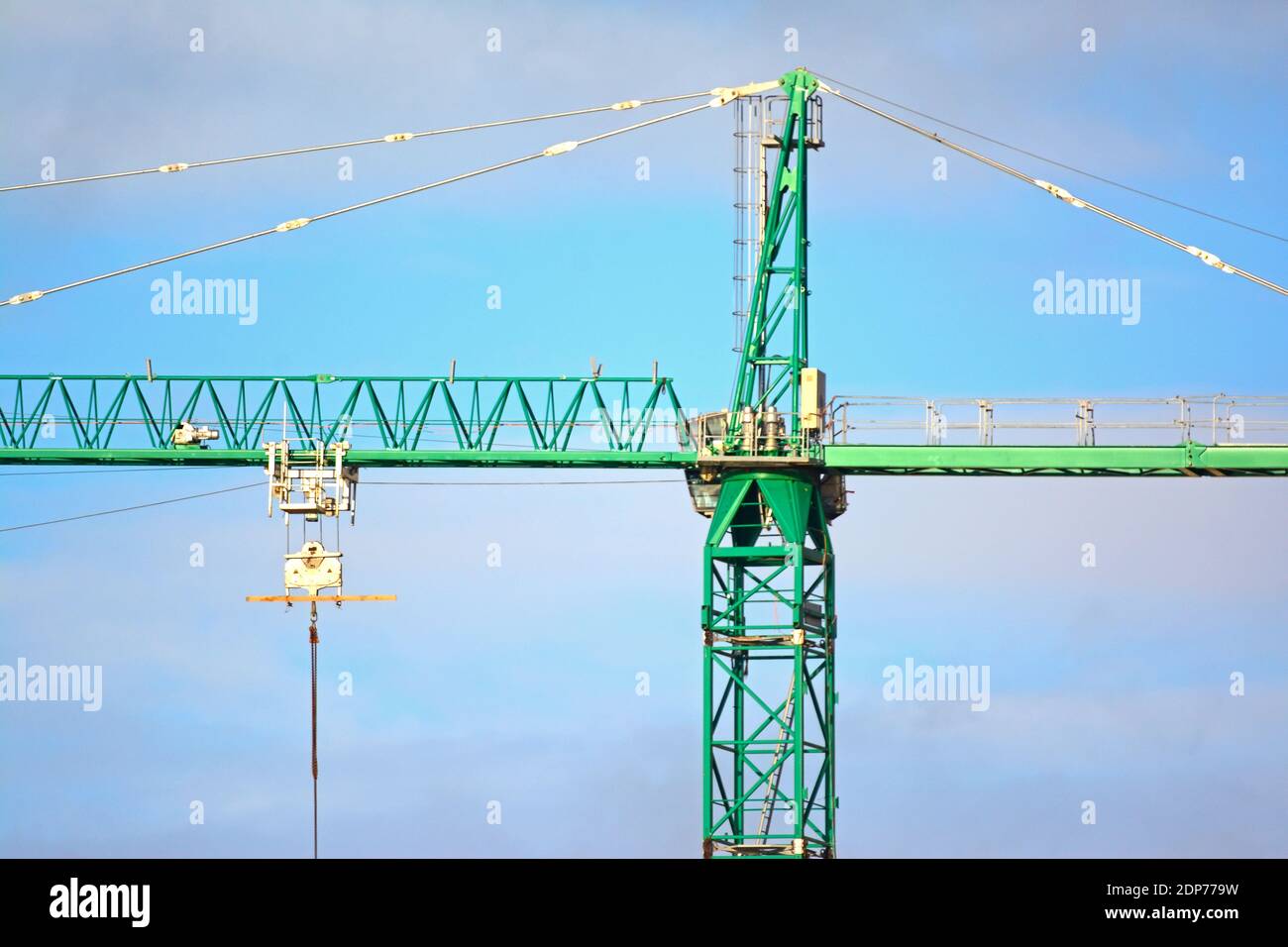 close-up of tall crane on the construction site Stock Photo - Alamy