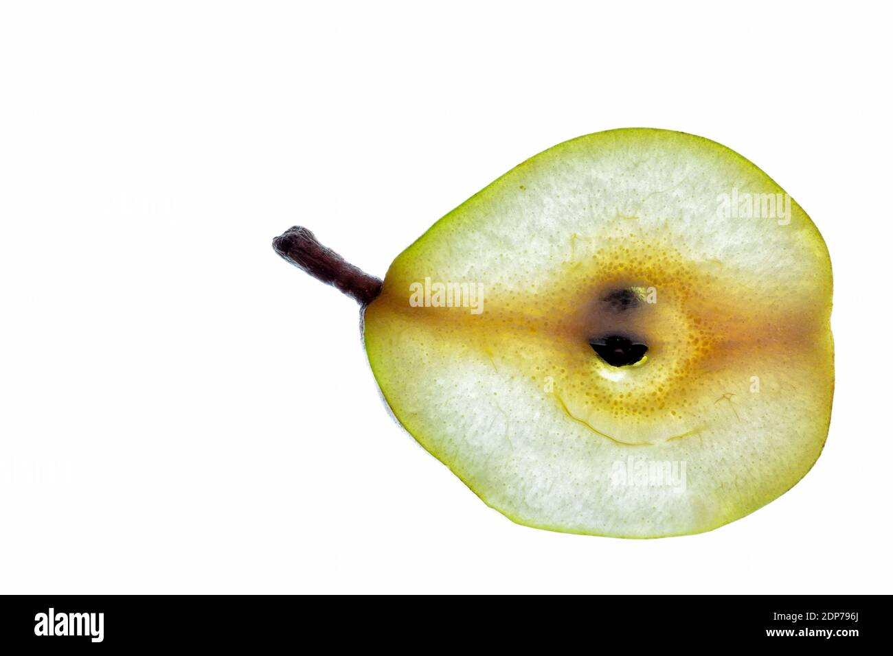 Green pear slice isolated on a white background with copy space ...