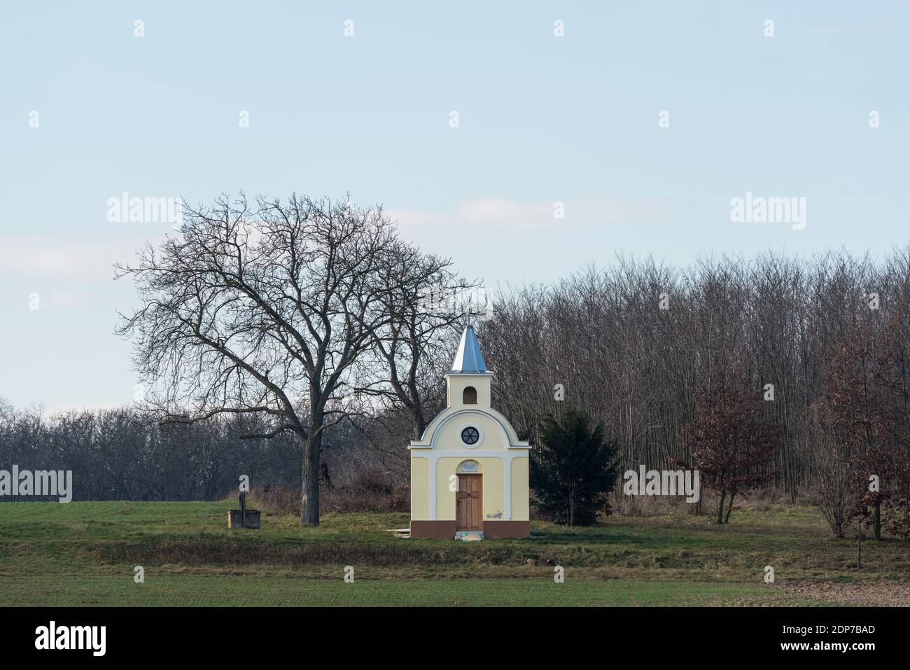 small chapel with a tree Stock Photo - Alamy