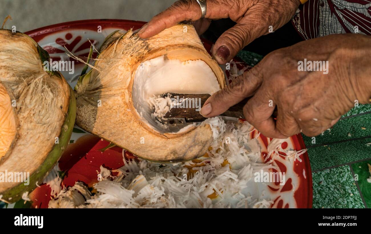 Coconut scraping hi-res stock photography and images - Alamy