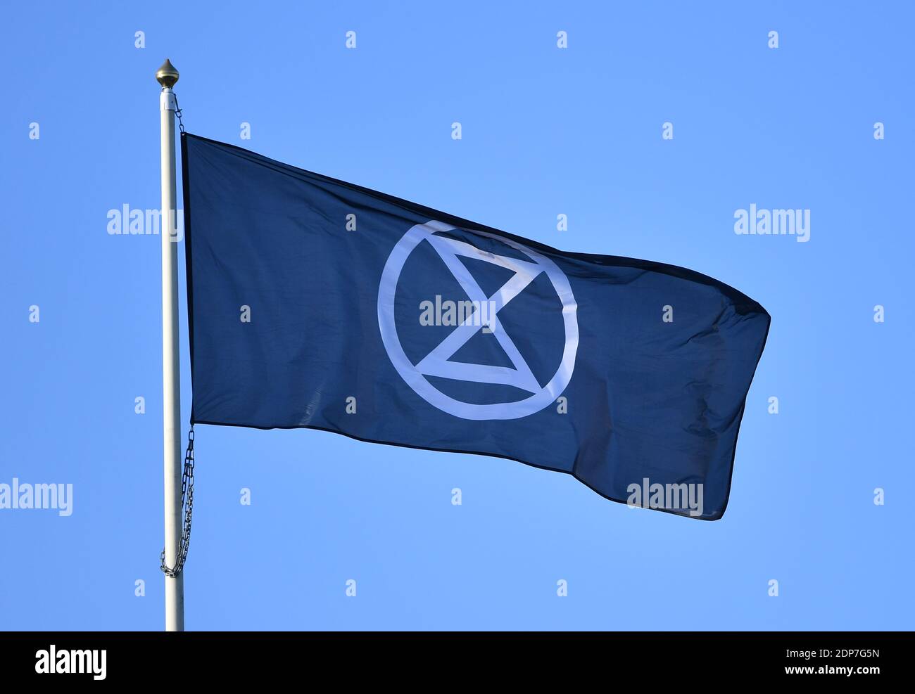 An Extinction rebellion flag at The New Lawn, Nailsworth Stock Photo ...