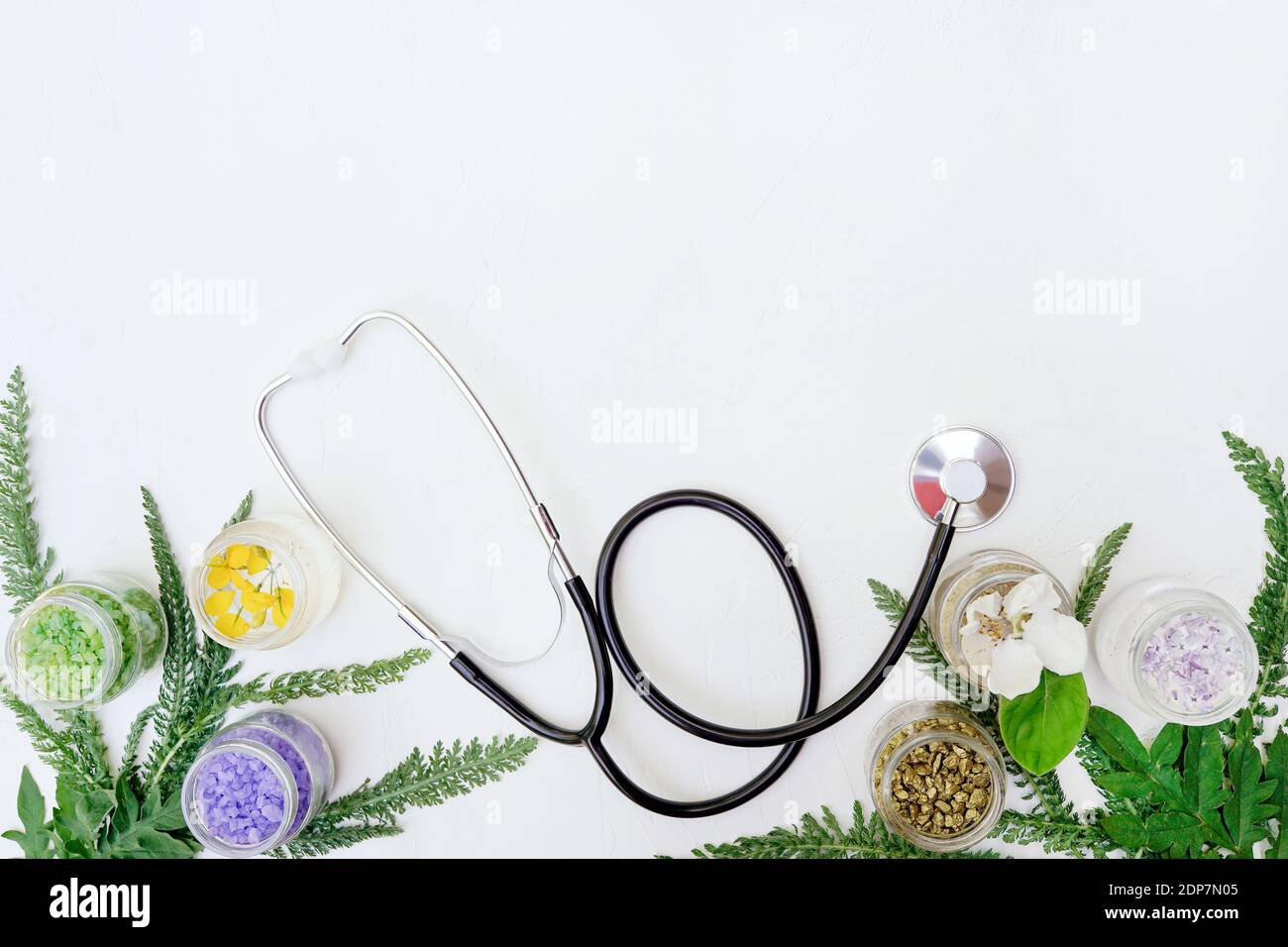 Fresh herb and stethoscope alternative medicine concept with copy space ...
