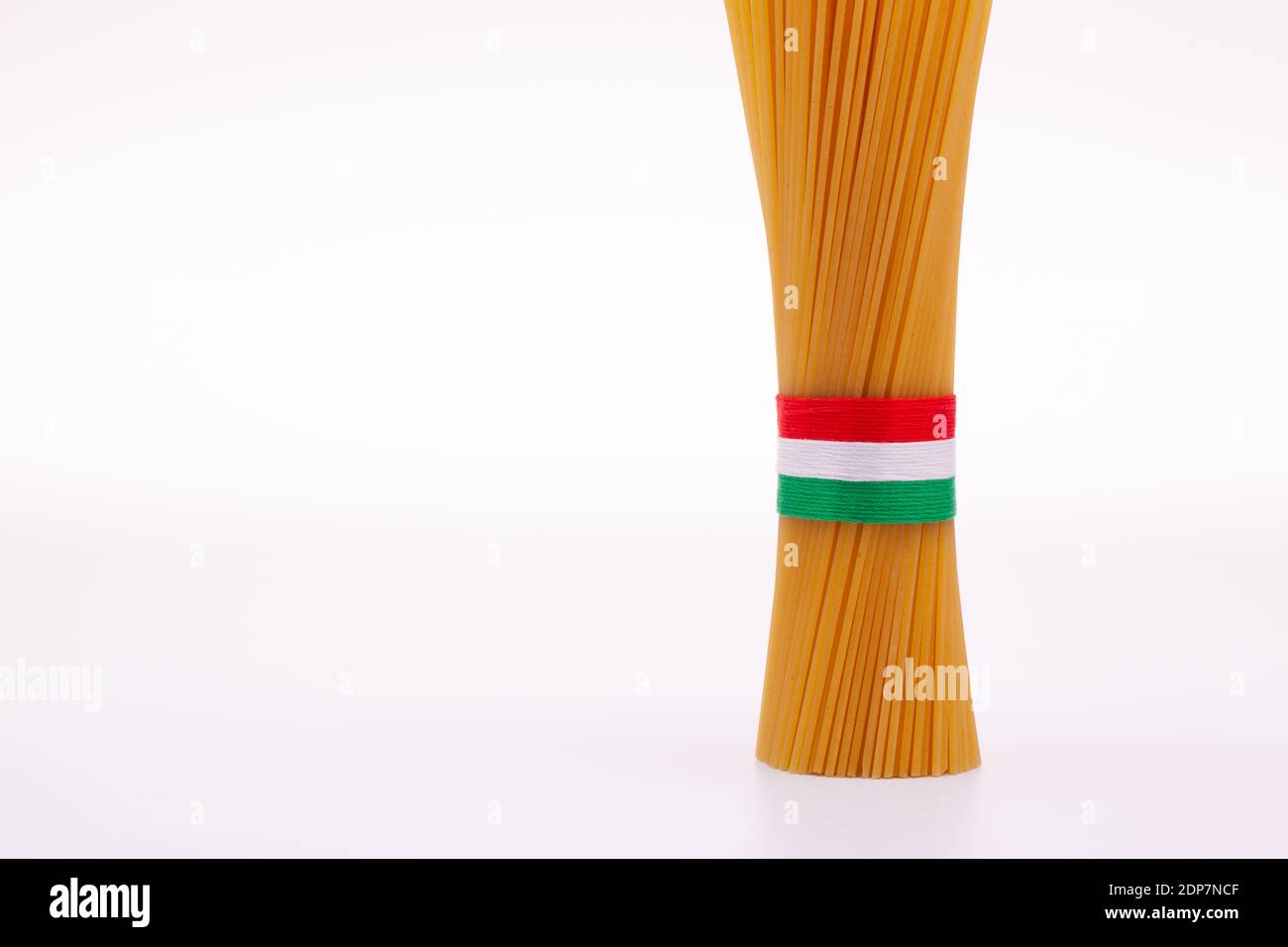 Bundle of spaghetti and Italian flag on the white background Stock ...