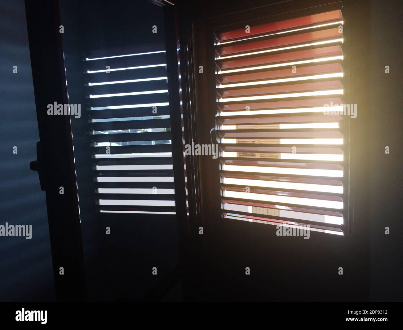 Sunlight streaming through blinds hi-res stock photography and images ...
