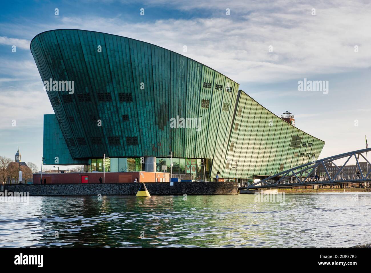Shot of the Nemo Science museum in Amsterdam taken from the river Ij ...