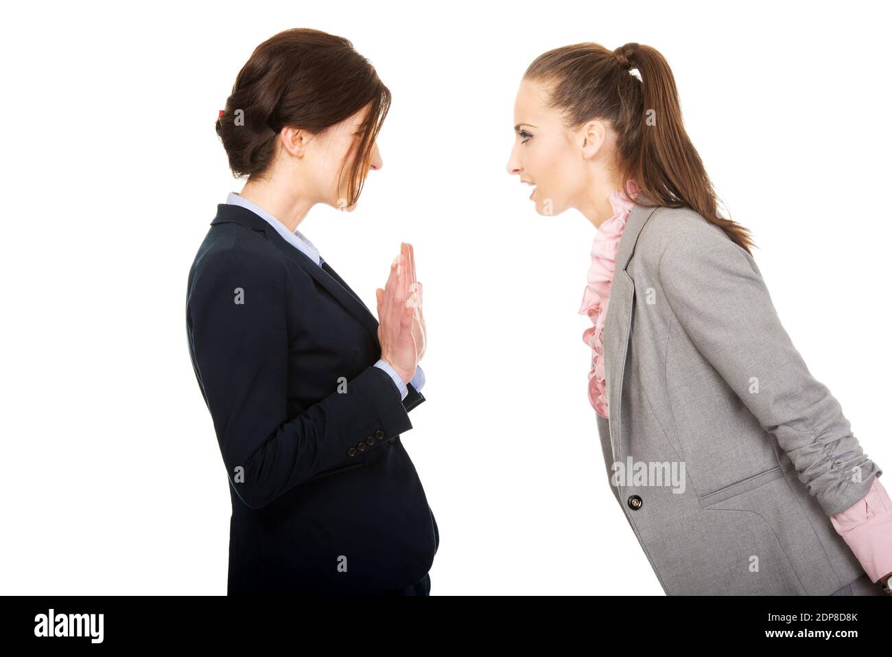 Side View Of Female Manager Shouting On Coworker Against White ...