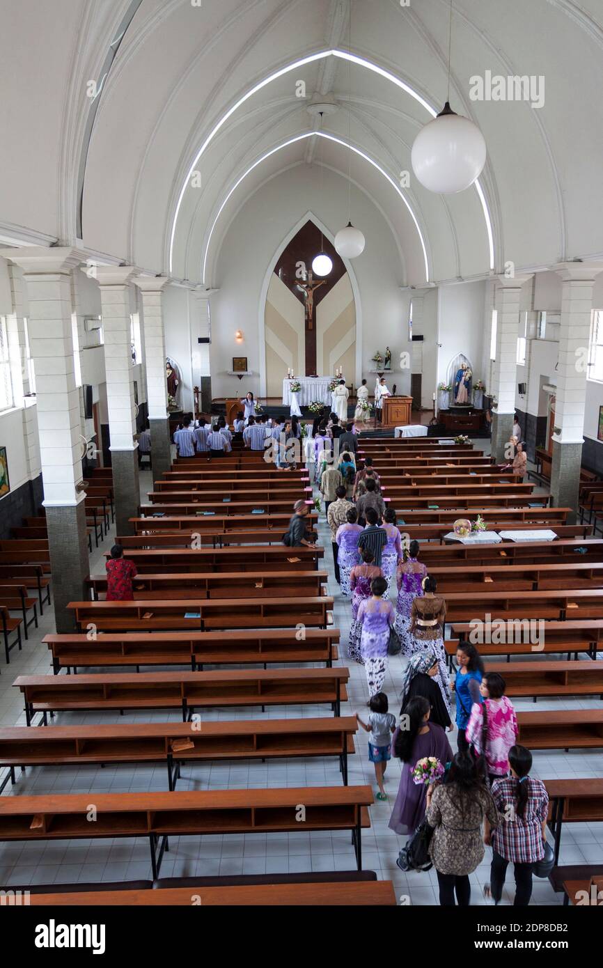 A wedding blessing in a catholic church, with a very beautiful building ...
