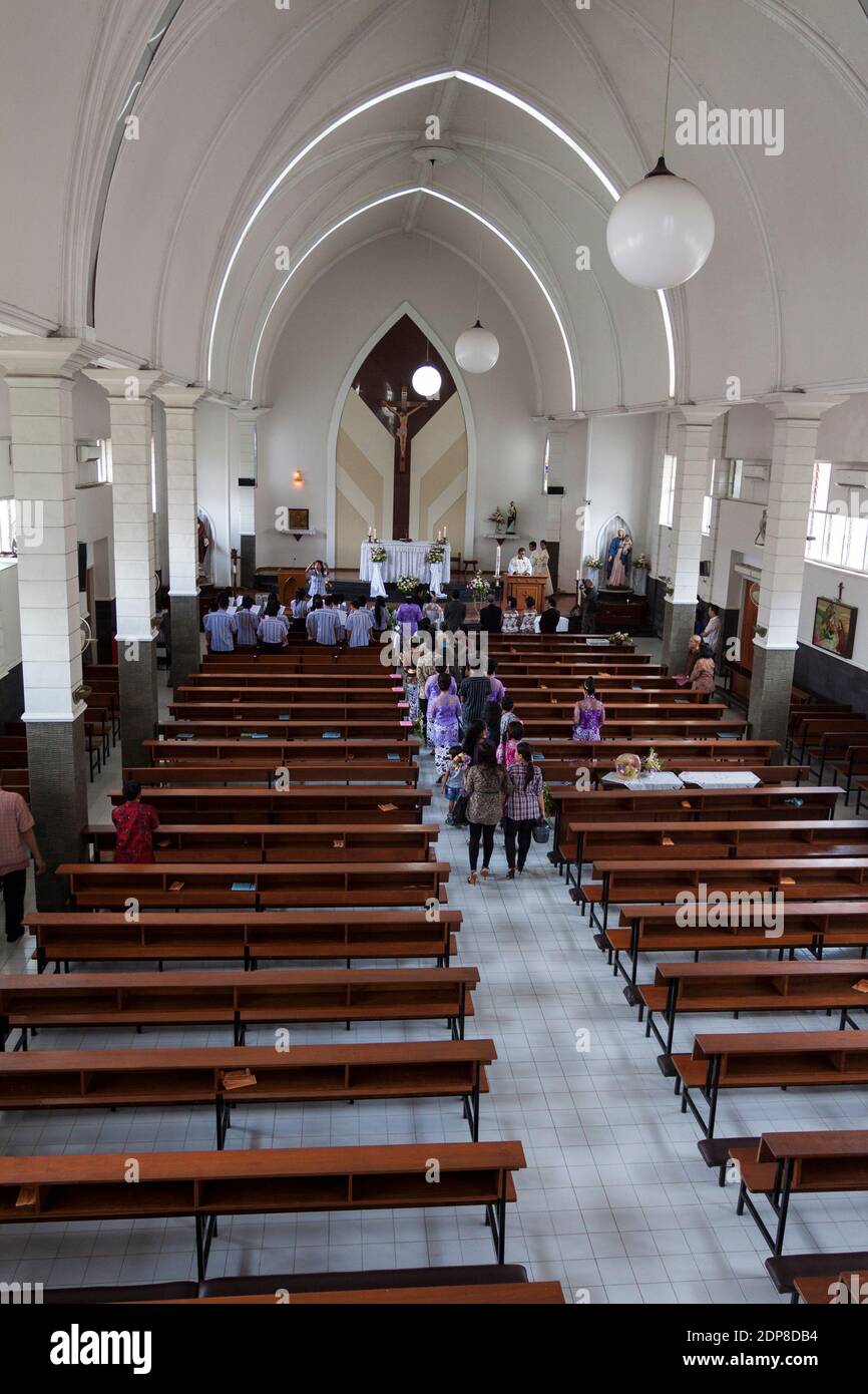 A wedding blessing in a catholic church, with a very beautiful building ...