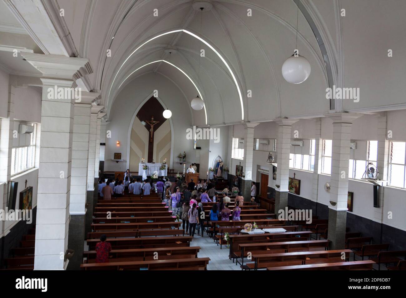 A wedding blessing in a catholic church, with a very beautiful building ...