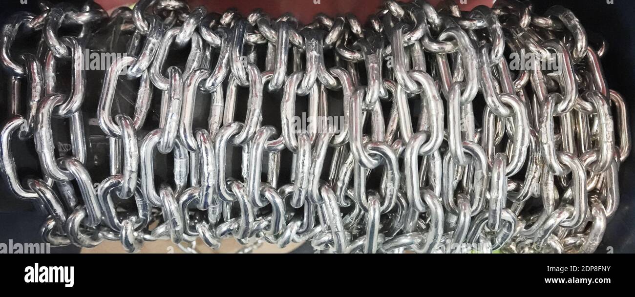 Roll of still chain Stock Photo - Alamy