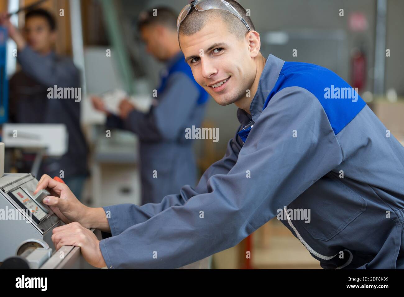 Man operating machines hi-res stock photography and images - Alamy