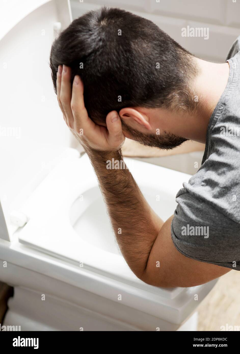 Person with head in toilet bowl hi-res stock photography and images - Alamy