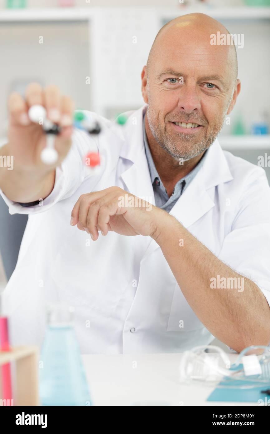 happy mature laboratory worker smiling to the camera Stock Photo - Alamy