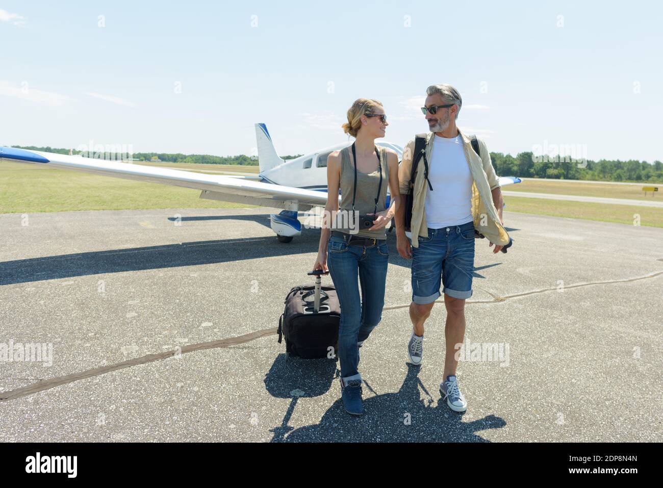 Private jet couple hi-res stock photography and images - Alamy