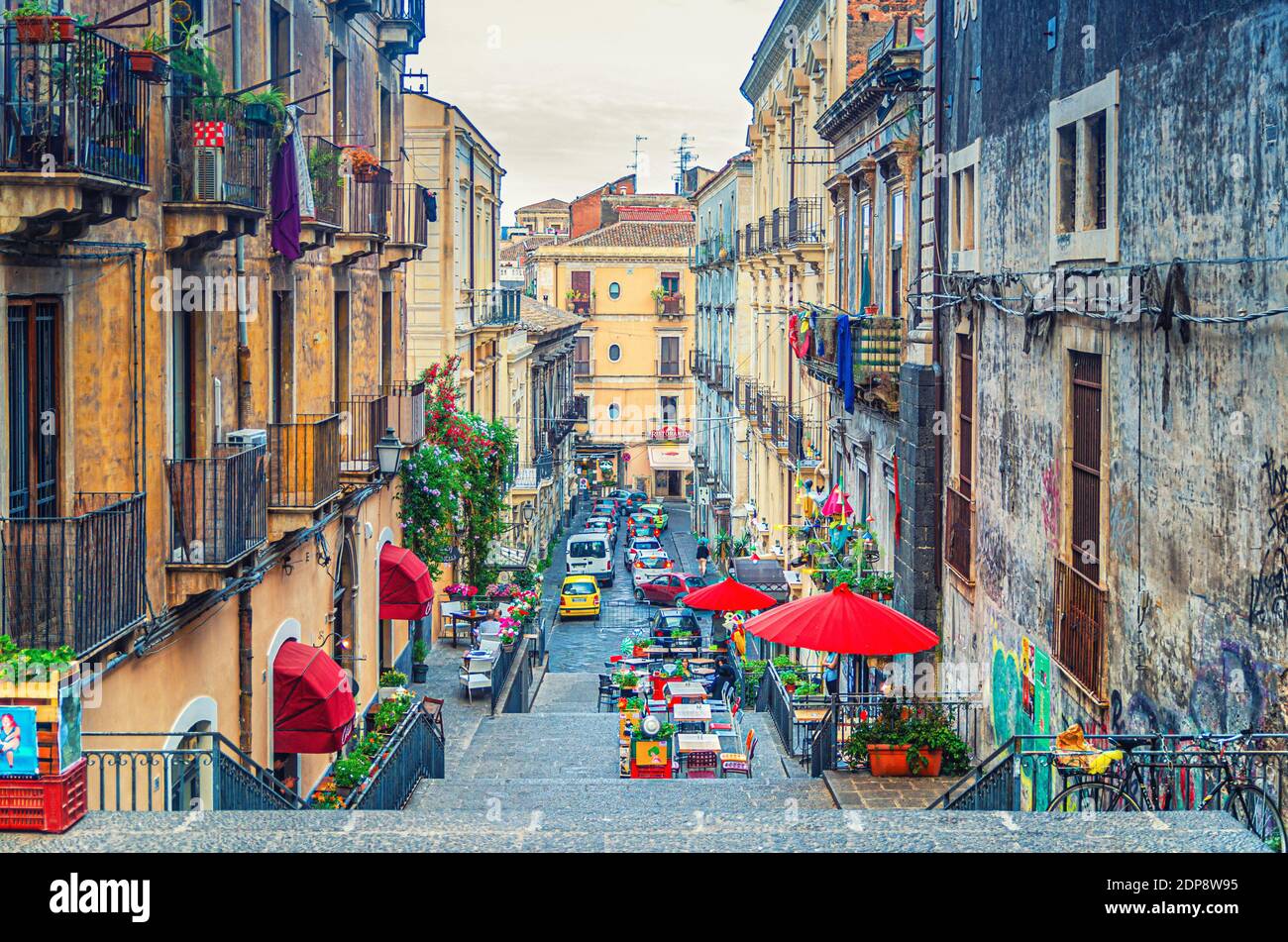 Italy, Catania, May 12, 2018: Narrow street with stairs, old buildings ...