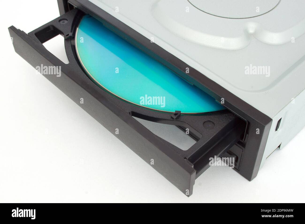 Open-ended CD - DVD drive with a black cap and disk inside. Isolated on ...