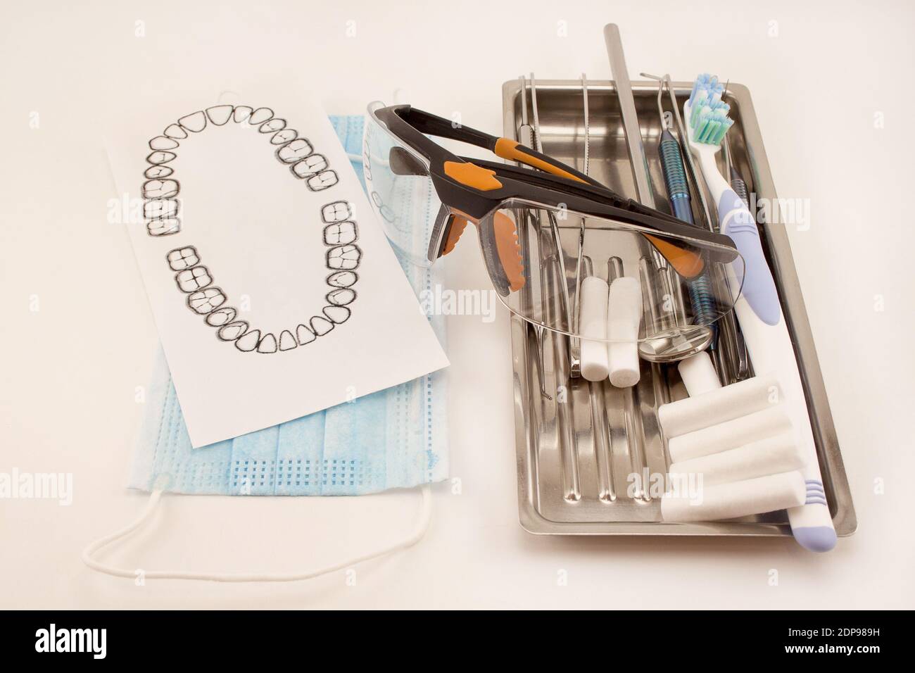 Group of dental tools and accessories for the treatment and care of ...