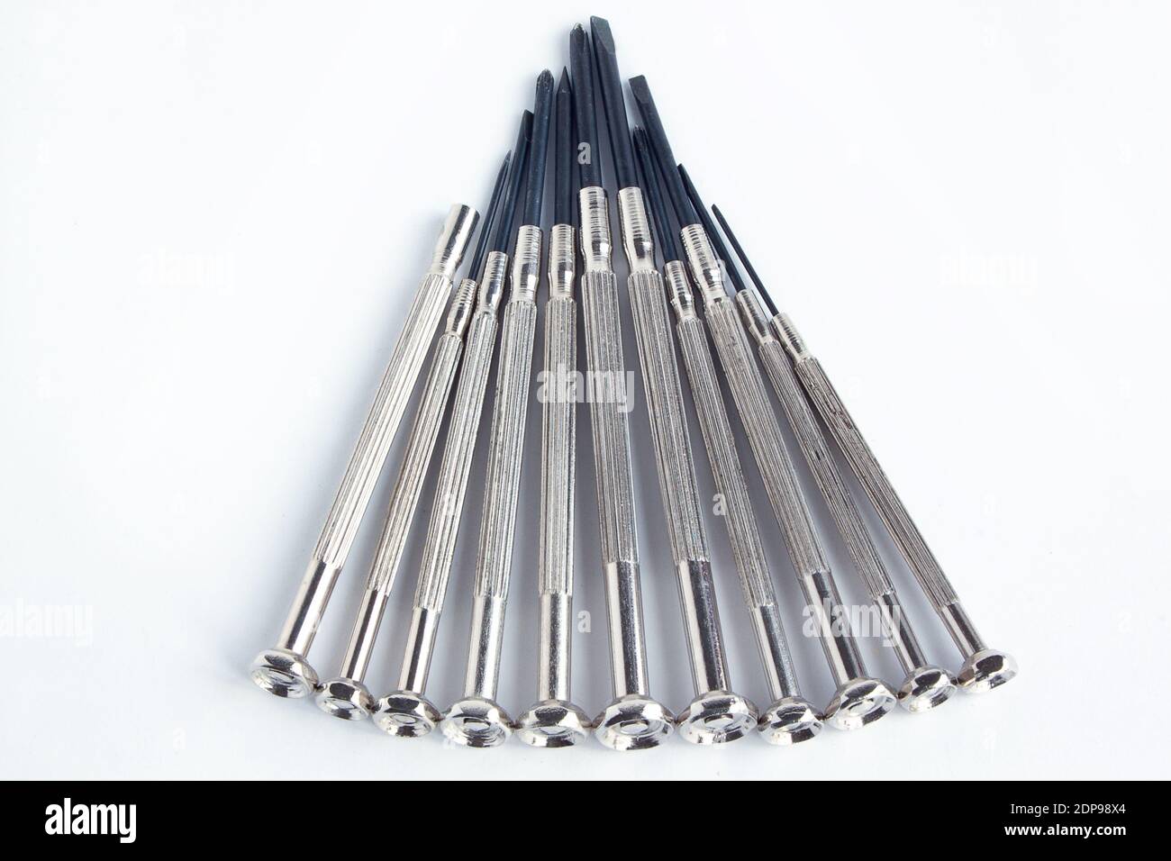 Set of clock screwdrivers isolated on a white background. Closeup Stock ...