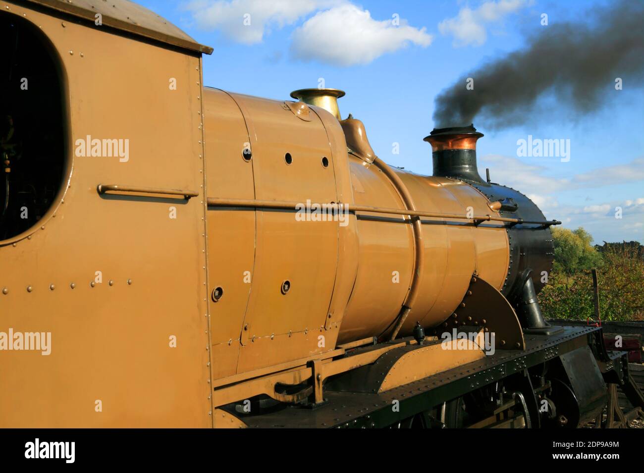 Old vintage locomotive steam railway train engine with smoke blowing ...