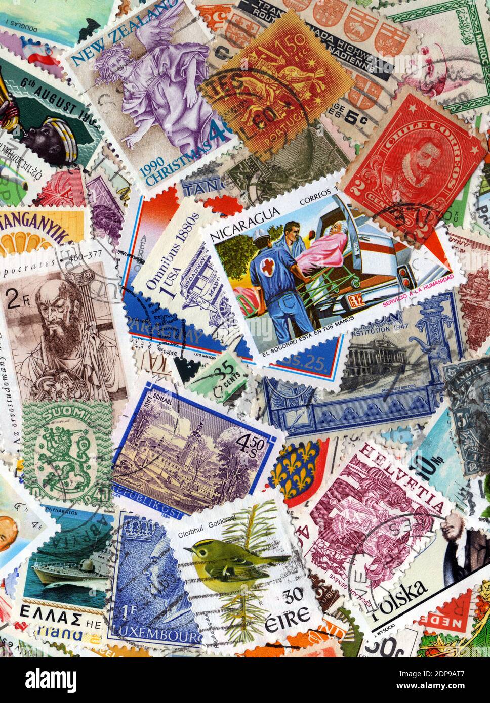 A large world foreign postage stamp collection background, stock photo ...