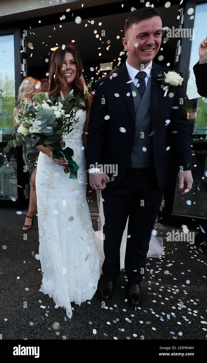 Emma Jesson and her new husband Adam Jesson are greeted by a small ...