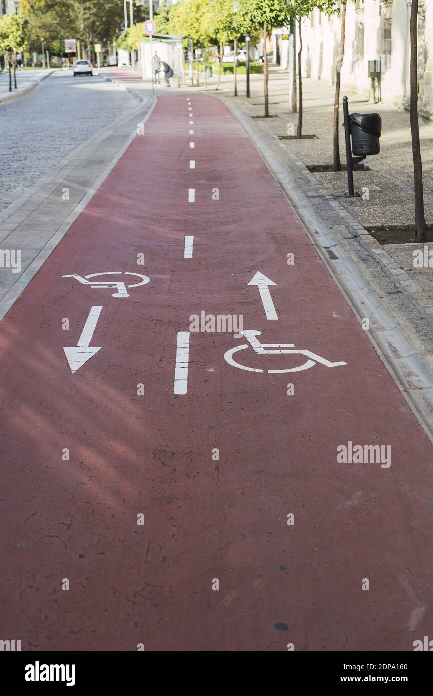 A separate road for disabled, disabled road sign on the asphalt Stock ...