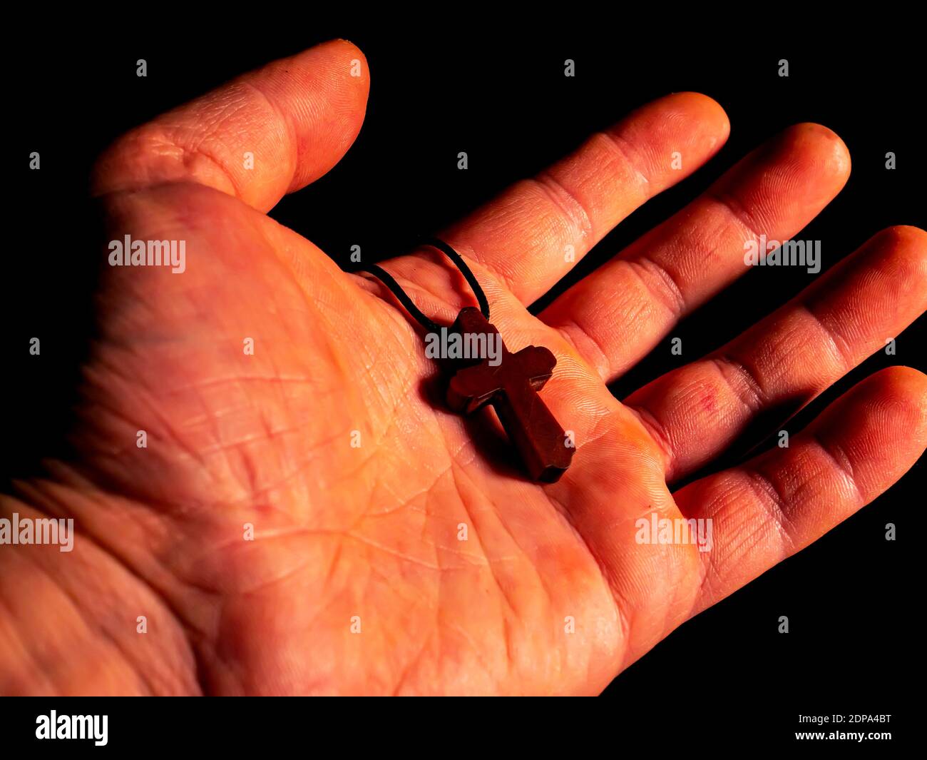 Christian pectoral cross on a mans palm. Christian pectoral cross ...