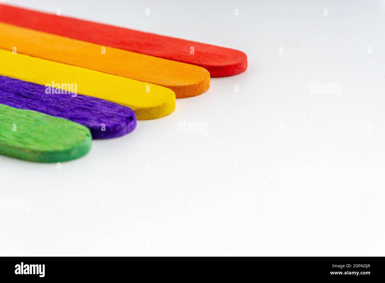 Multi Colored Popsicle Sticks Over White Background Stock Photo - Alamy