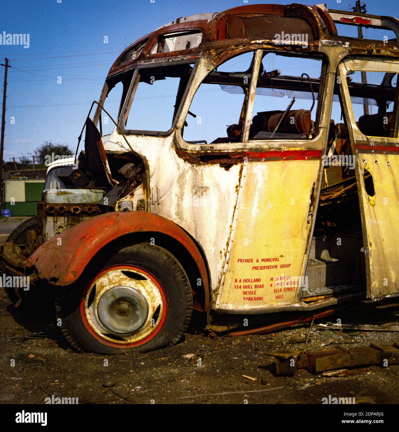 Rusting derelict bus dumped on wasteland Stock Photo - Alamy