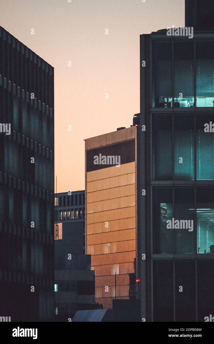 OSAKA, JAPAN - Dec 27, 2016: Sun setting behind buildings in Japan ...