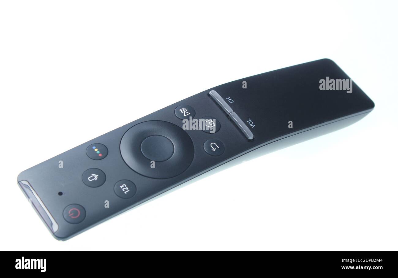 Modern tv remote isolated on white background Stock Photo - Alamy