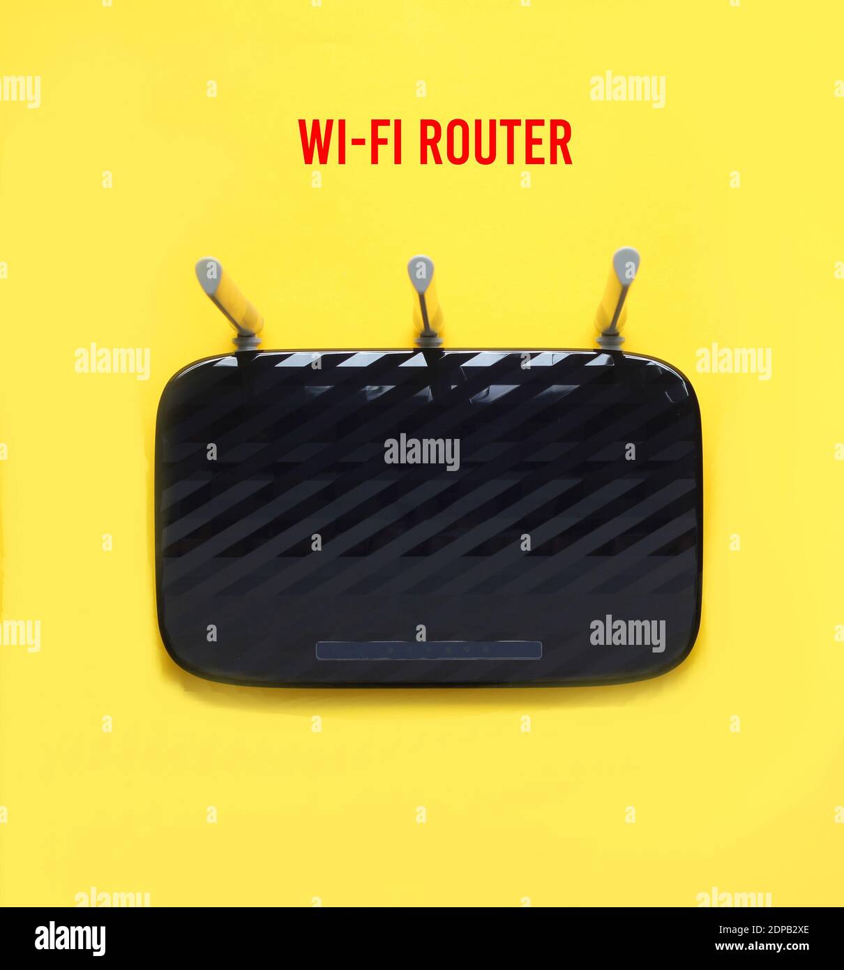 Black Three-antenna wi-fi router isolated on yellow background. Set of ...