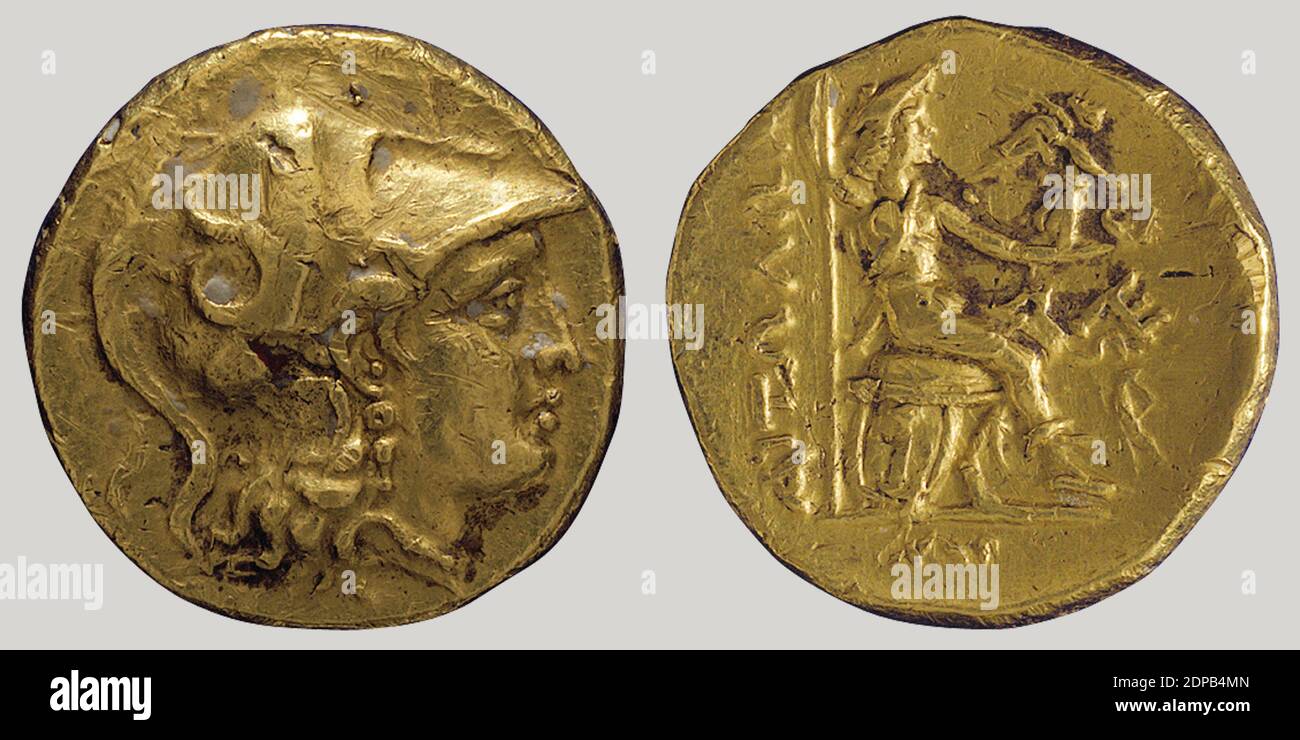 A top view of two gold coins isolated on gray background Stock Photo ...