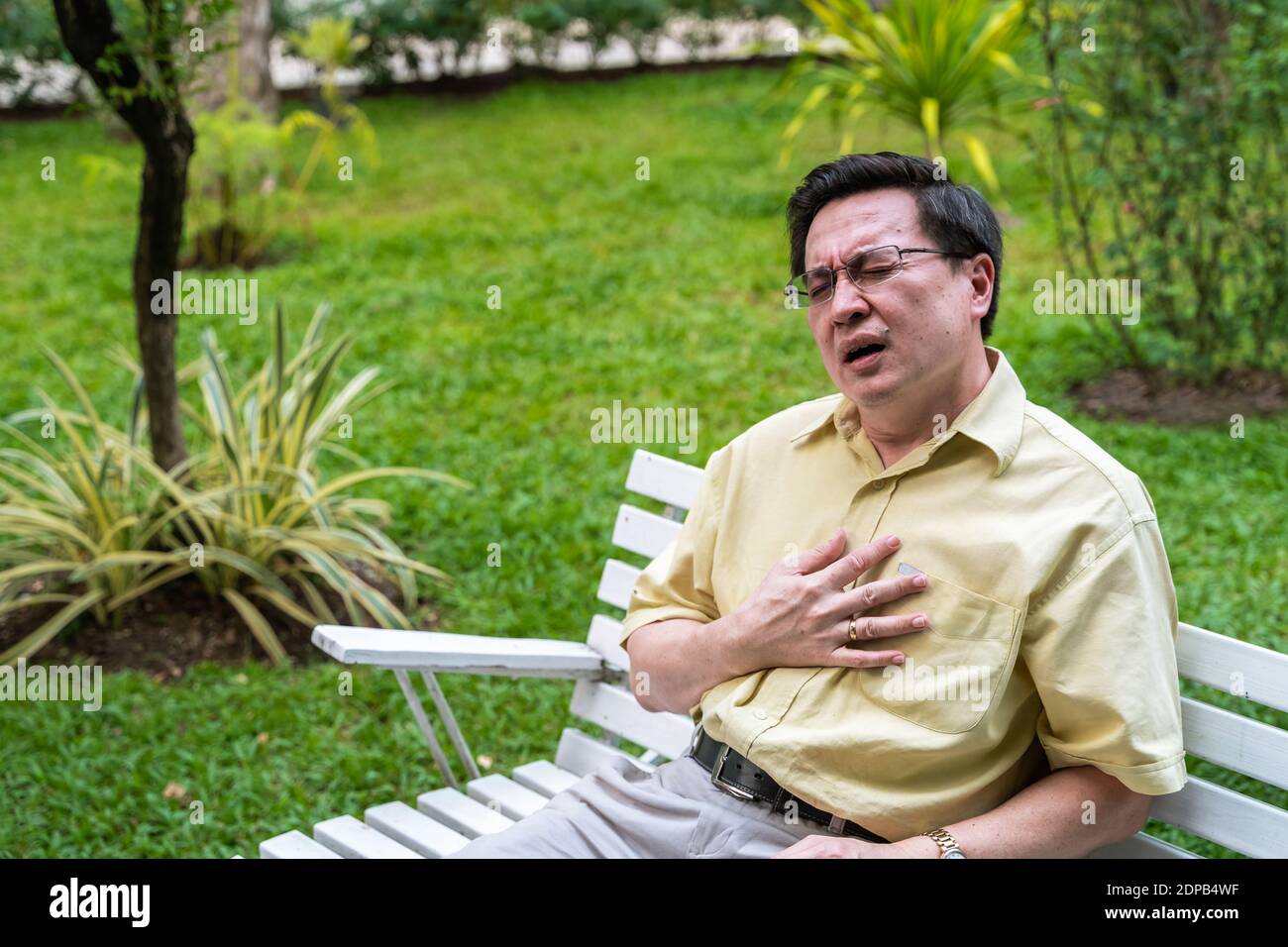 Indian man chest pain hi-res stock photography and images - Alamy