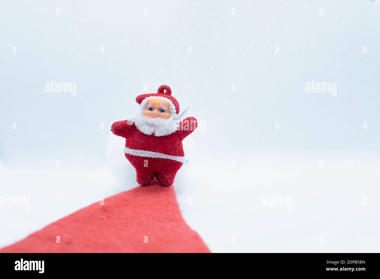 Santa Claus standing on the red carpet on a white backgrounds Stock ...