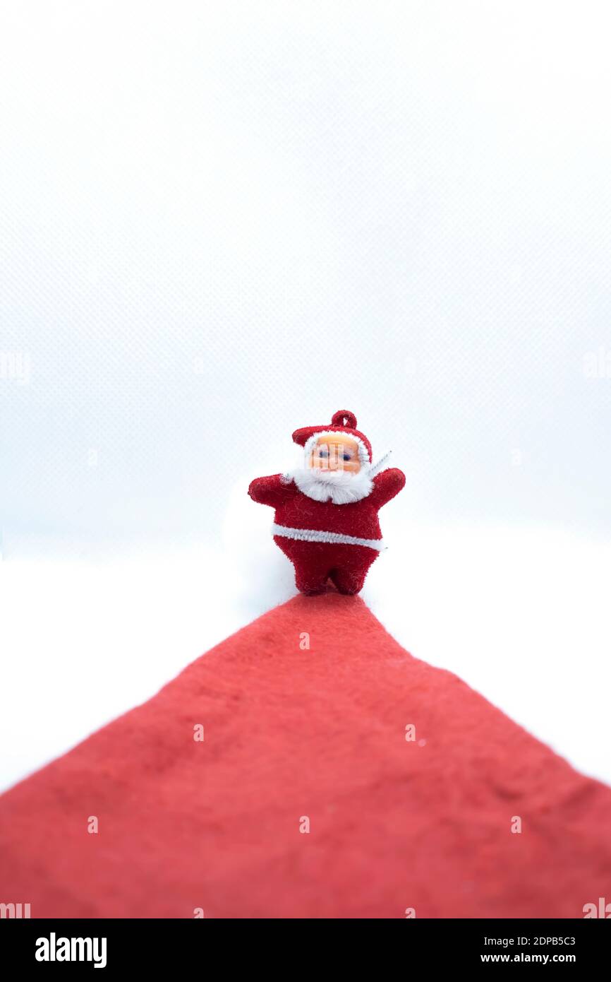 Santa Claus standing on the red carpet on a white backgrounds Stock ...
